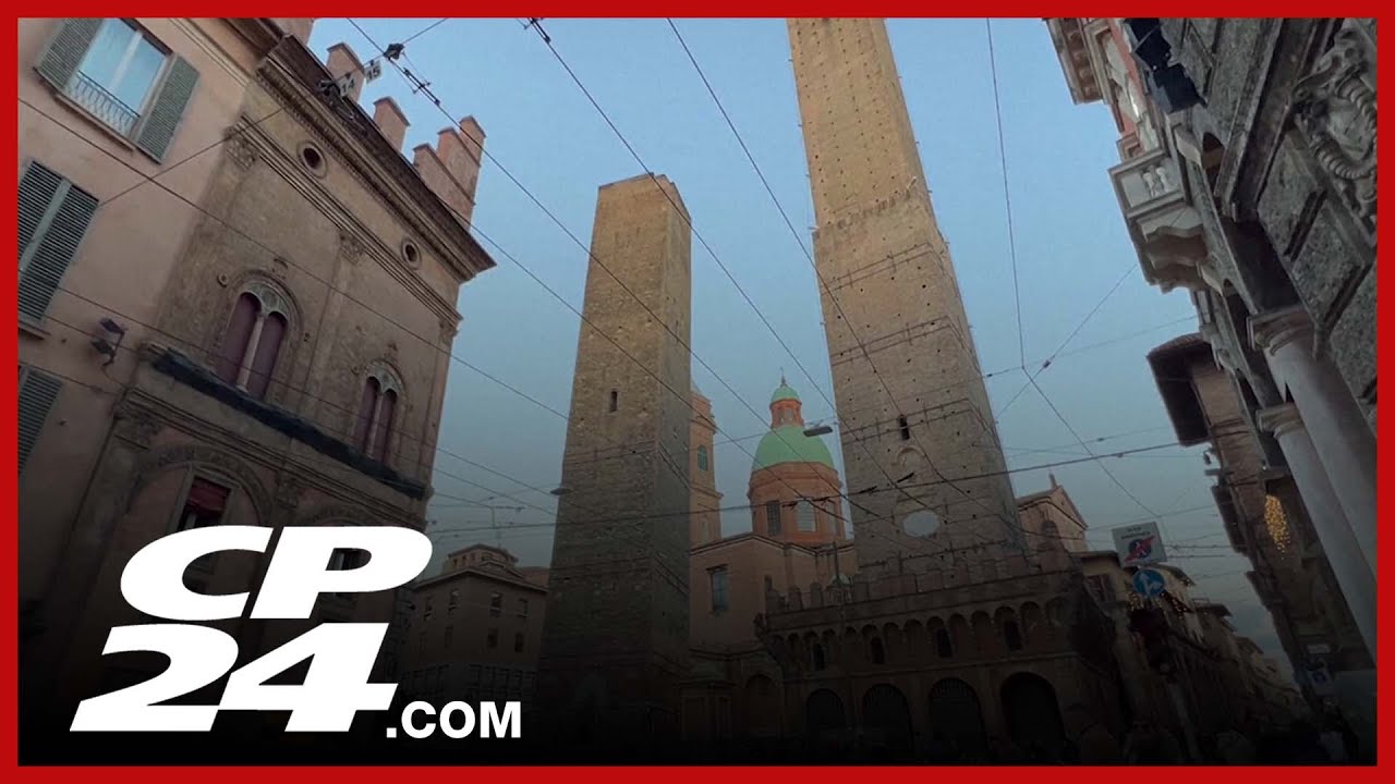 Italy leaning tower secured over collapse concern - YouTube