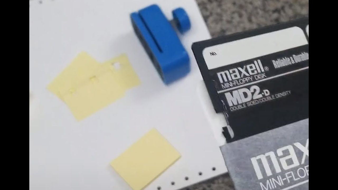 How to prevent label bending and disk cracking from disk notcher - YouTube