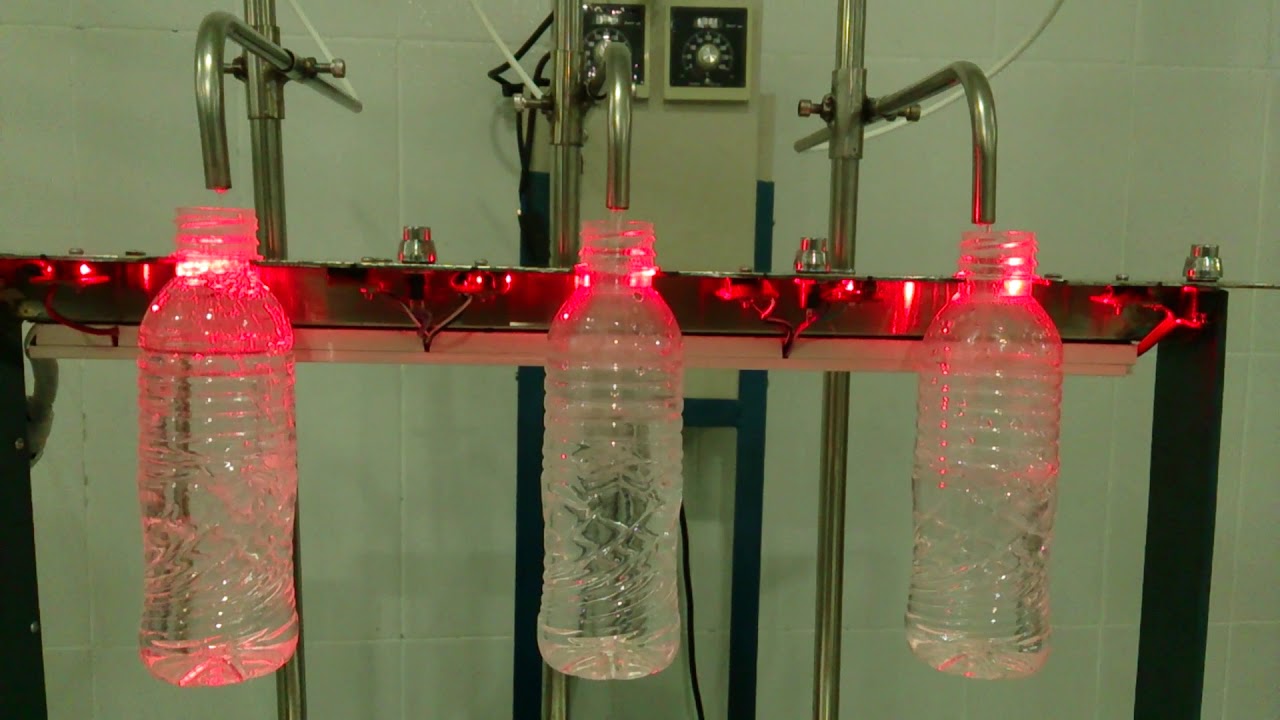 bottle filling machine / mesin pengisi botol otomatis - YouTube