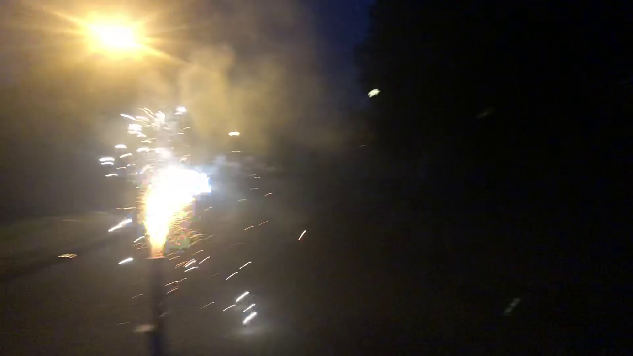 Jumping over fire works - YouTube
