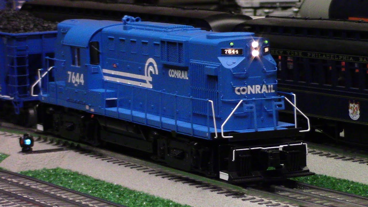 MTH Premier Conrail RS-11 and Freight Cars - YouTube