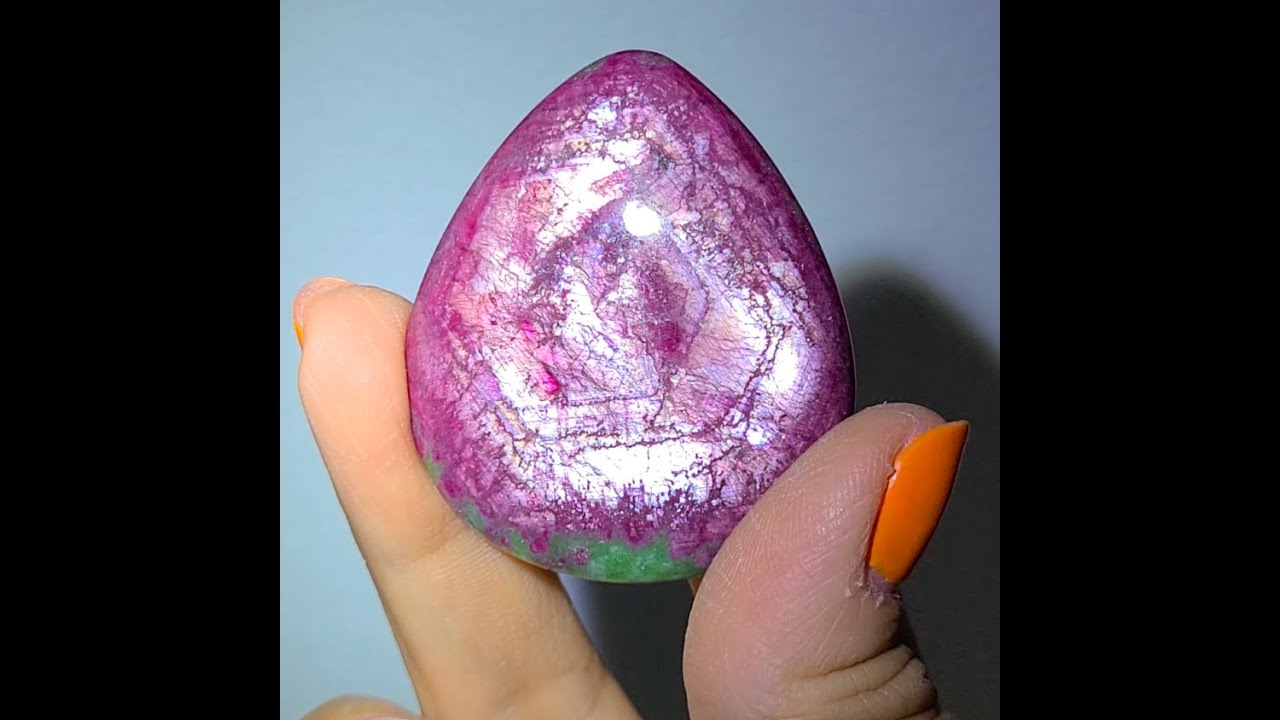 Ruby in zoisite with rainbow inclusions, UV reaction, and hexagonal-shaped crystallization ...