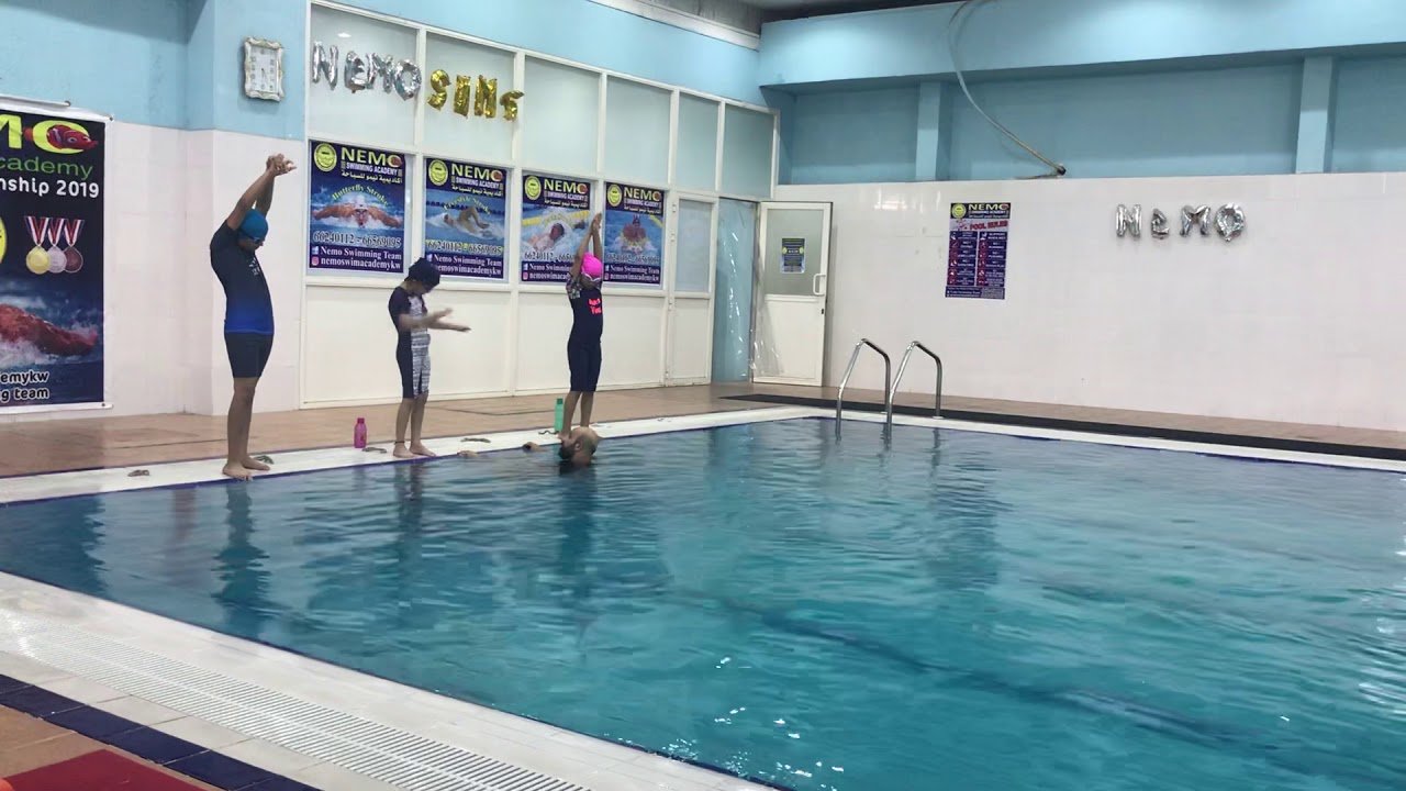 Swimming part 2 (Me in the middle of three) - YouTube