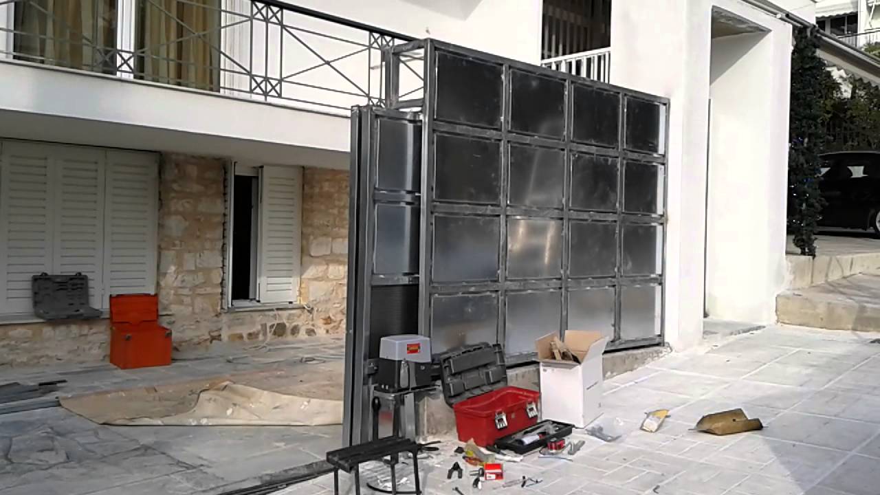 Τηλεσκοπικη συρομενη γκαραζοπορτα Μελίσσια - YouTube