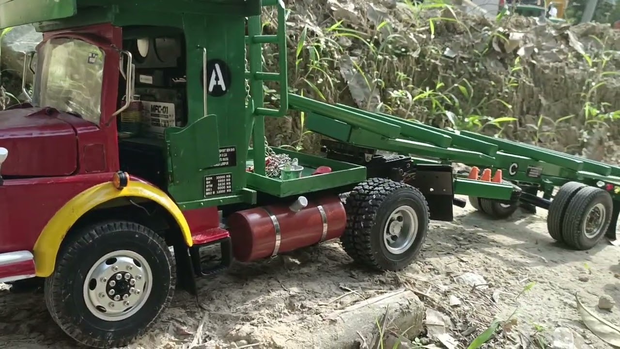 RC logging truck Mercedes 911 park near waterfall - YouTube