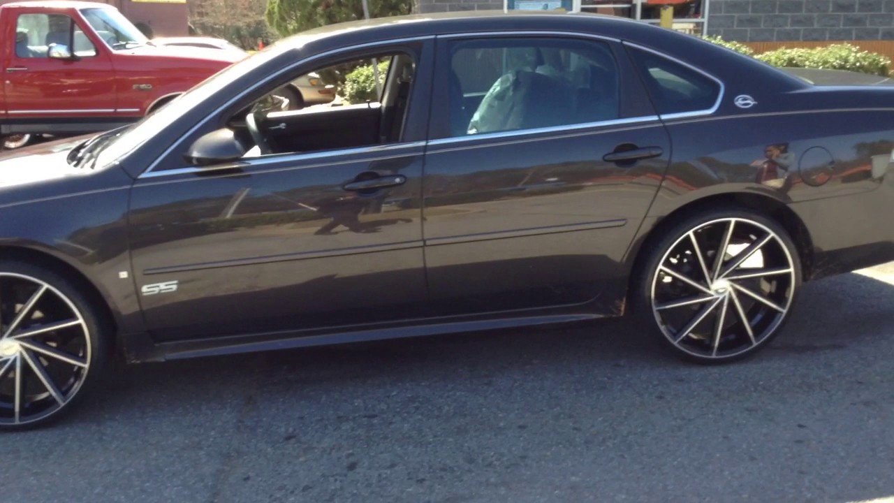 2009 CHEVROLET IMPALA SITTING ON 22" ROSSO INSIGNIA WHEELS AND 235/30 ...