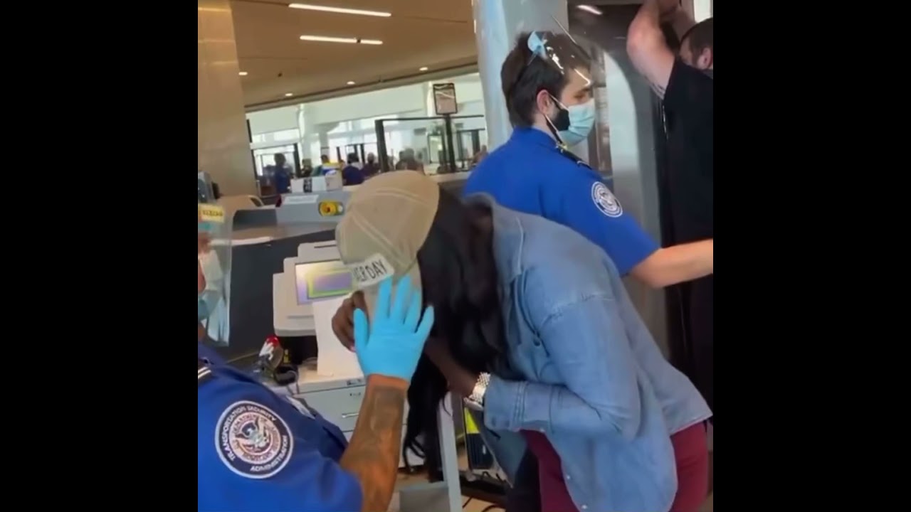 TSA makes lady pull off her wig cap. - YouTube
