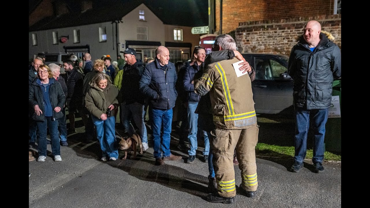 Touching moment villagers surprise firefighter who is retiring after 47 ...