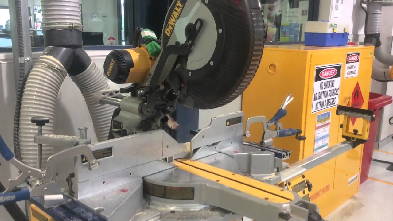 Drop saw operating machine - YouTube