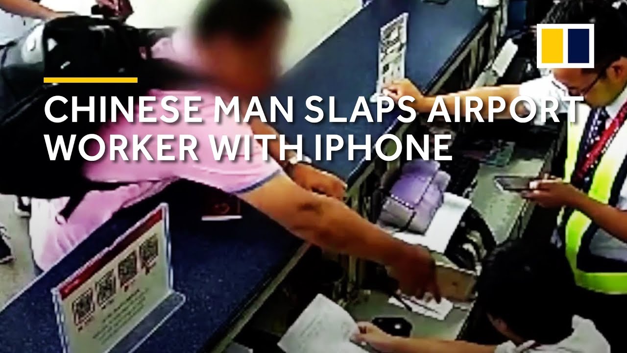 Chinese man slaps airport worker with his iPhone - YouTube
