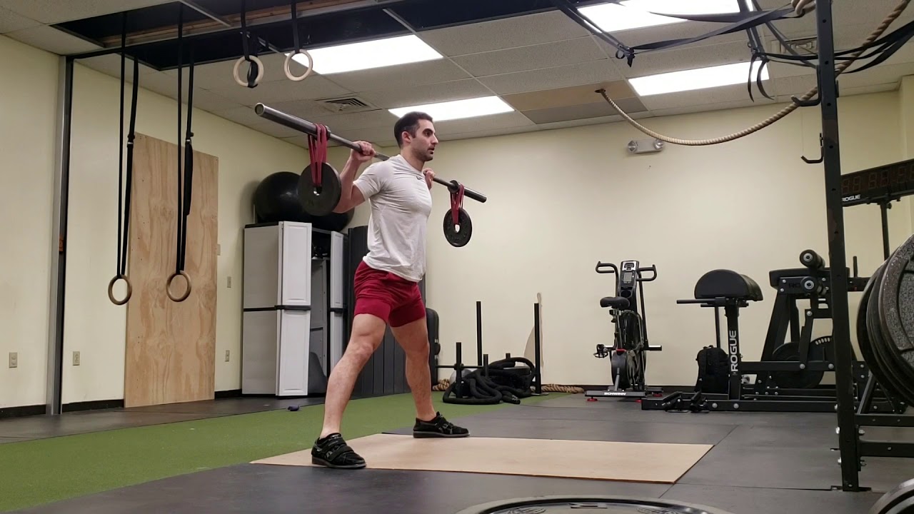 Back loaded lateral squat: Hanging plates (alternating) - YouTube