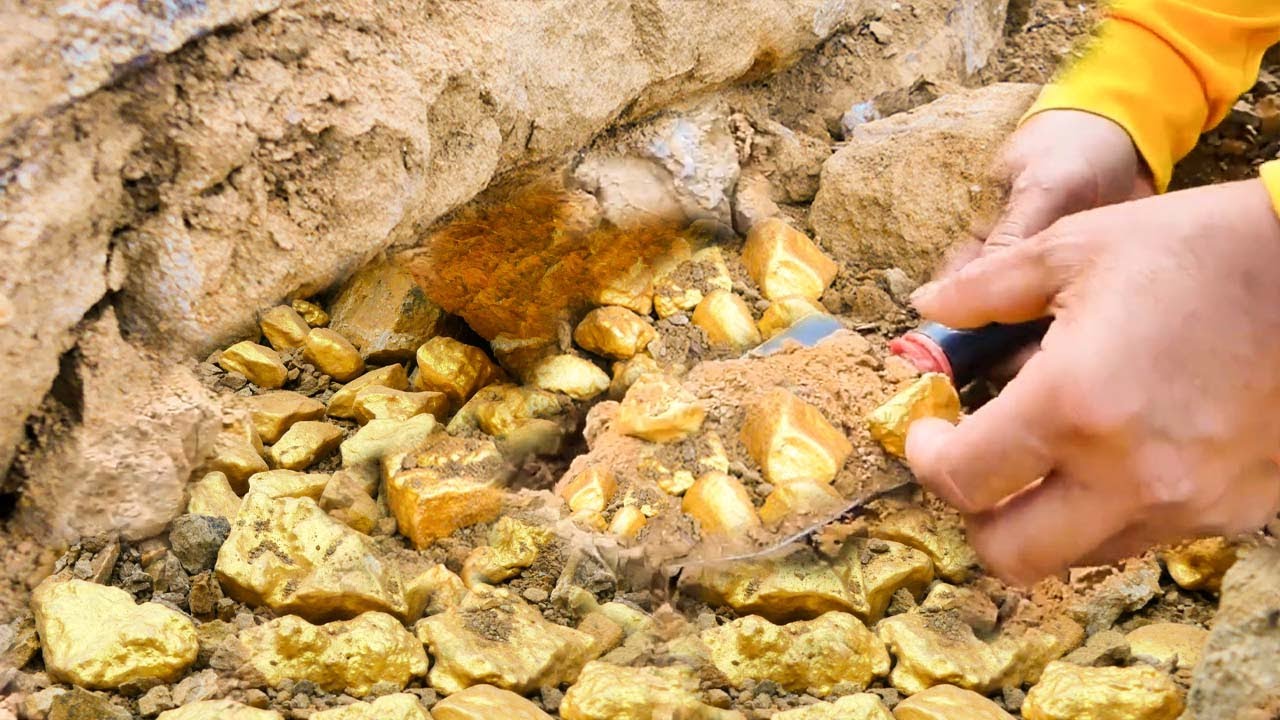 Best videos-A man mining gold treasure under stone at mountain river ...
