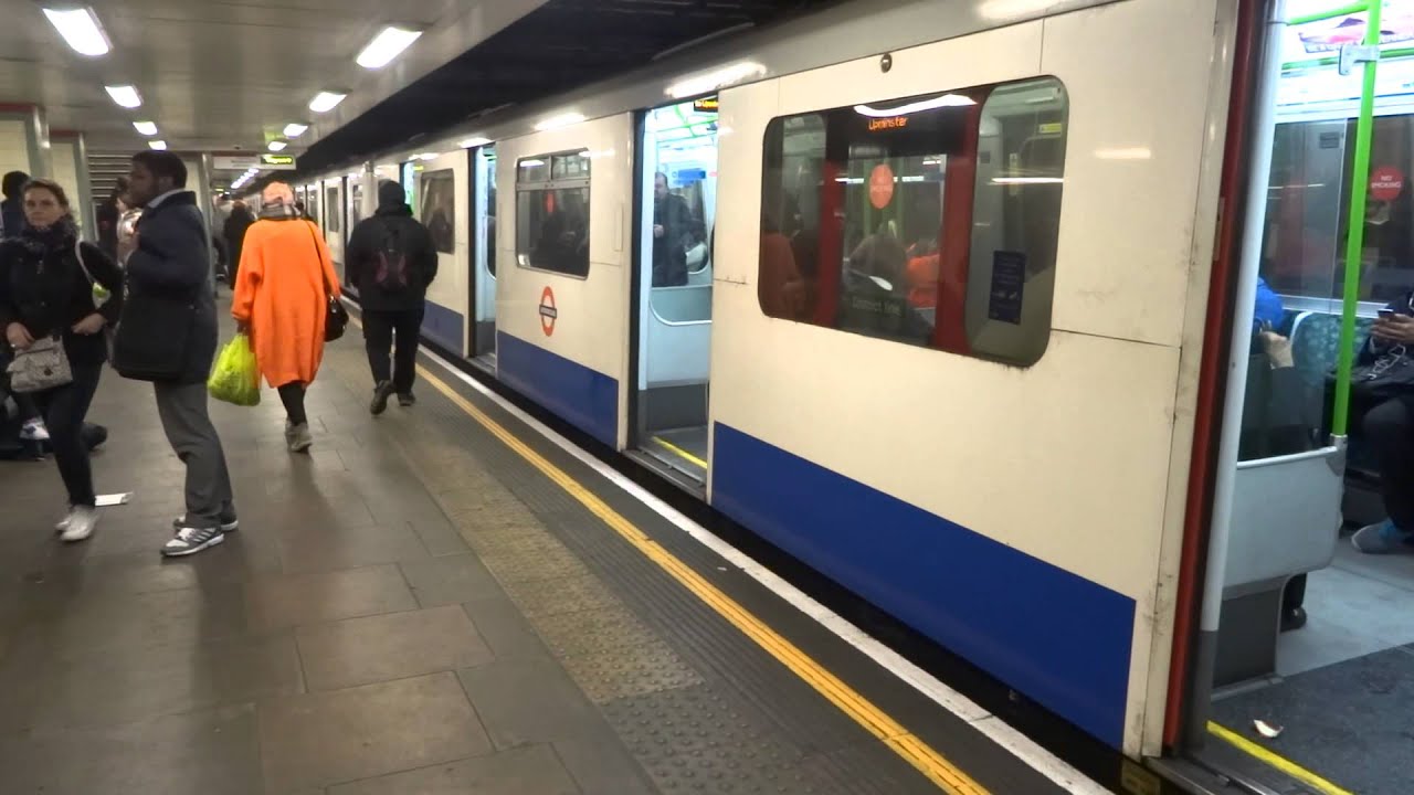 Classic District Line: D78 Stock and Central Line trains at Mile End ...
