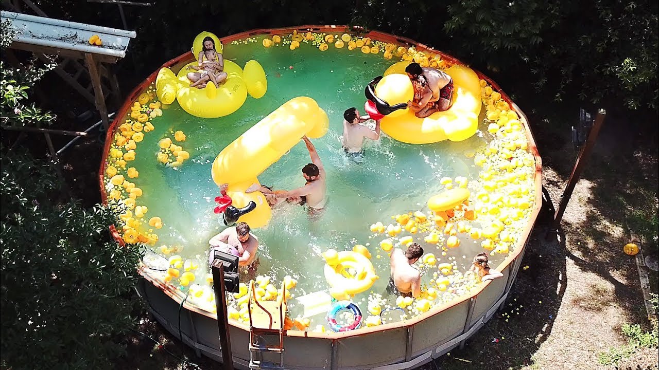 Swimming in a Pool FULL of Rubber Duckies!! | Sam & Nia - YouTube