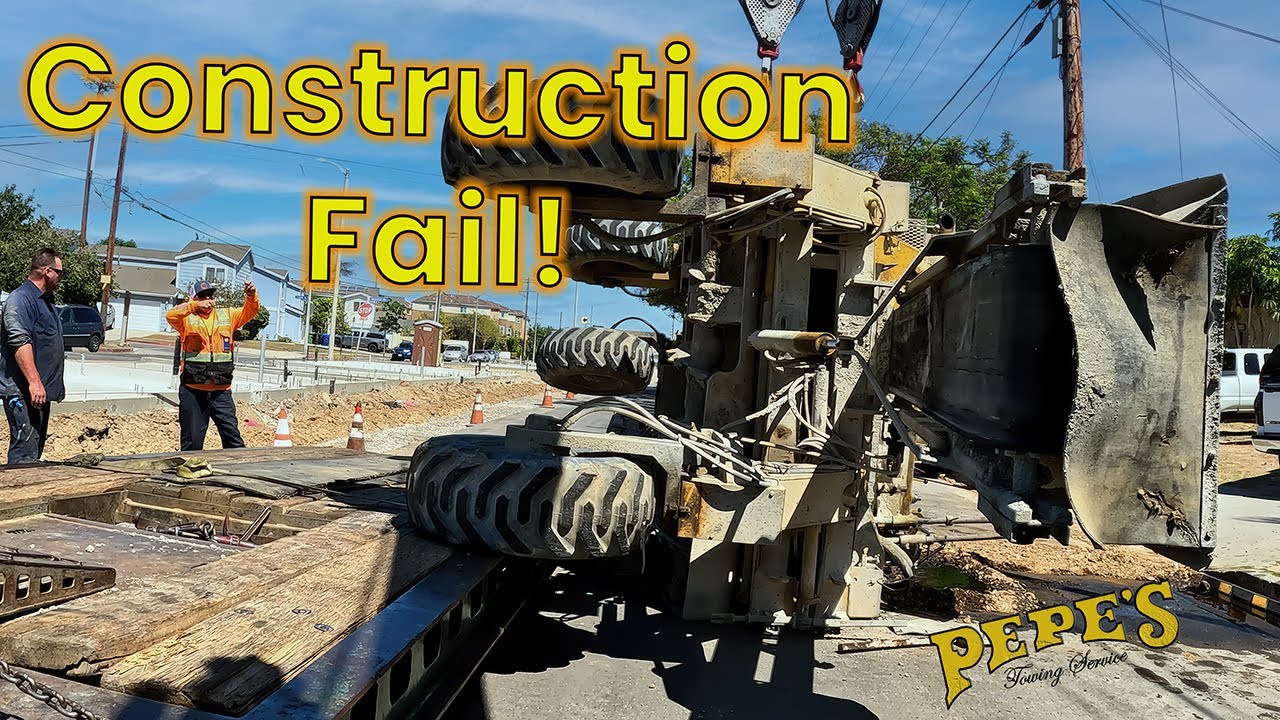 Construction Fail! Machine Falls off Trailer - YouTube