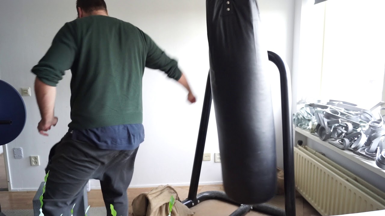 One hard right sideways hammer fist against the heavy bag 4 - YouTube