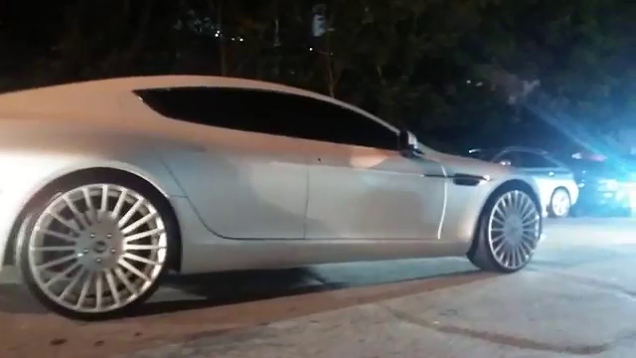 Yo Gotti's White Aston Martin Rapide on Forgiato 22s at Compound ...