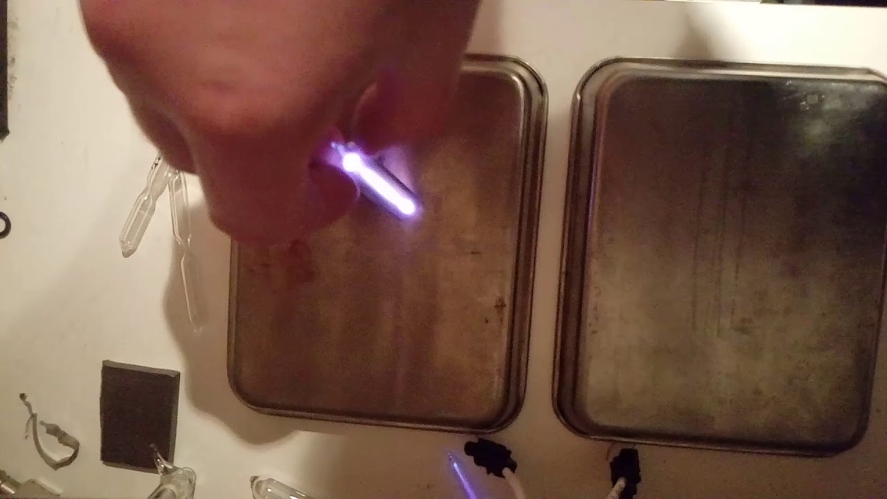 Helium Gas glow - YouTube