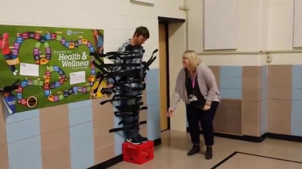 Members Taping Staff to the Wall - YouTube