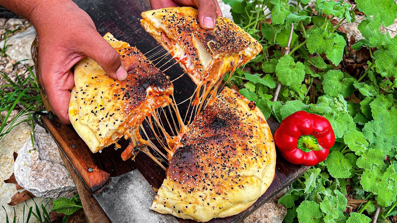 Campfire Calzone in the Wild | Easy & Delicious Outdoor Recipe - YouTube