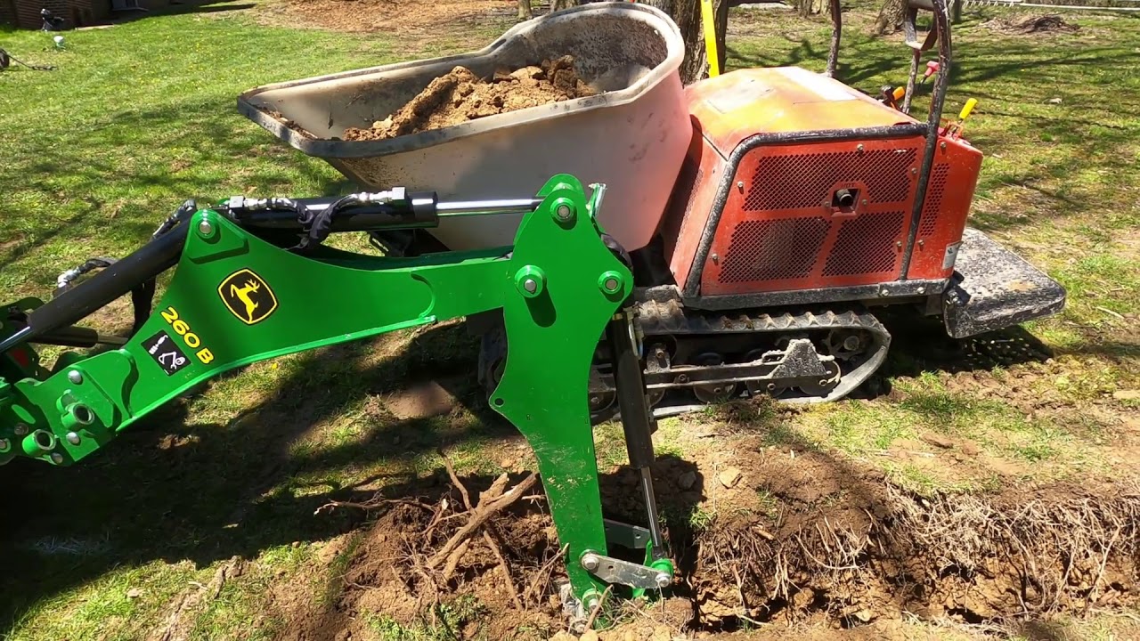 1025R DIGGING 3 FOOT DITCH - YouTube