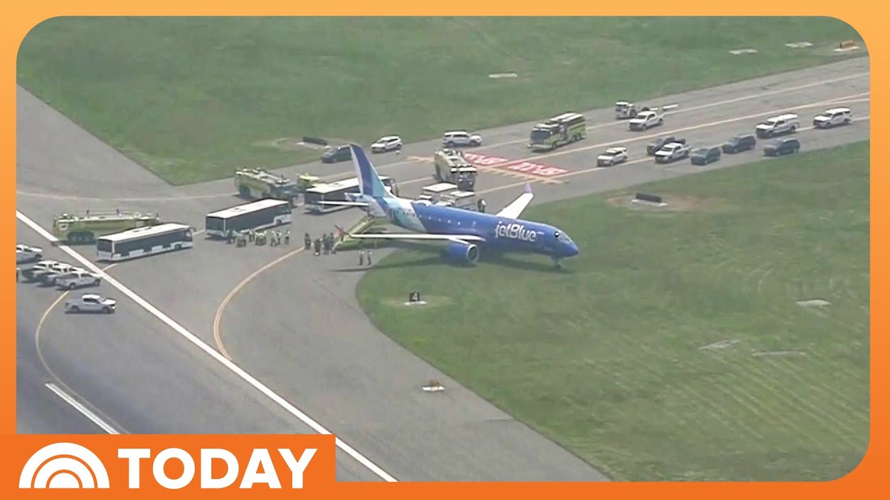 JetBlue Plane Skids off Runway at Boston's Logan Airport - YouTube