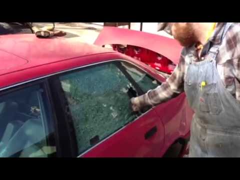 Breaking a car window with a center punch