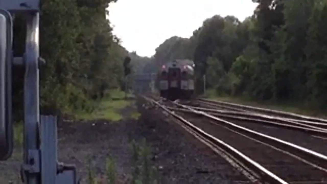 MBTA 1122 Passes Through Cherry St. Crossing - YouTube