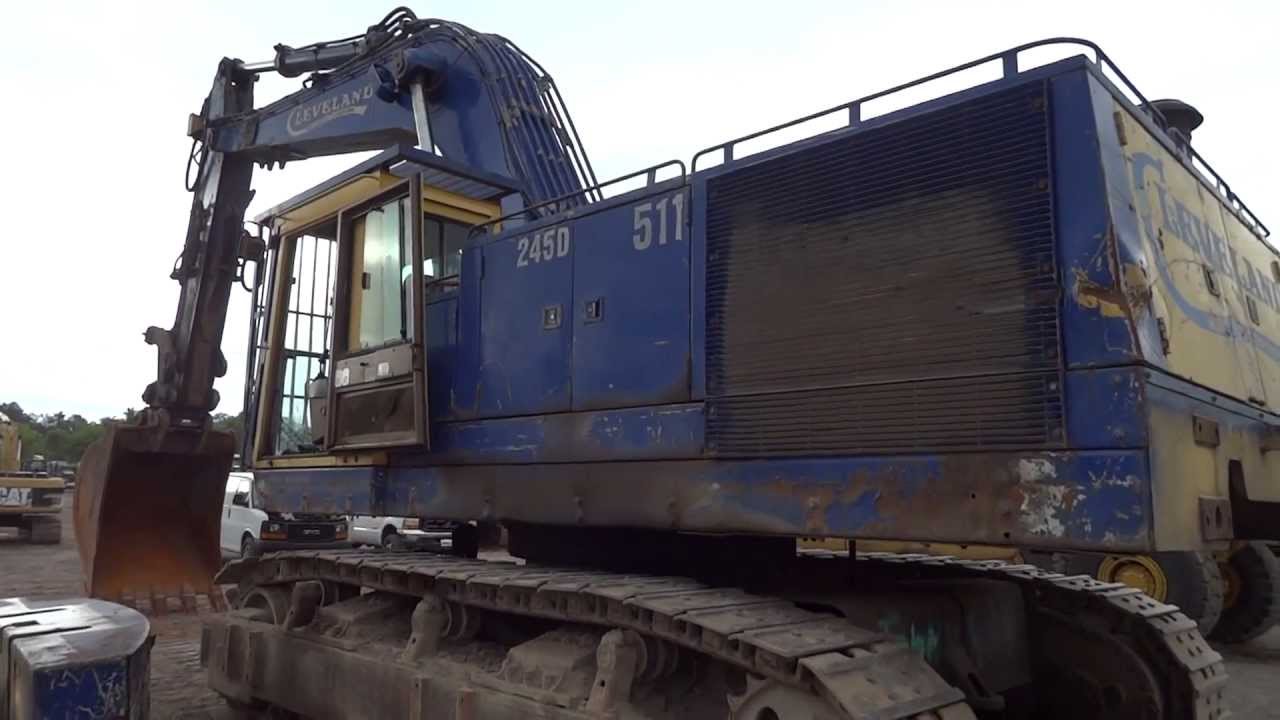 Cat 245 Excavator - Cleveland Wrecking Company - YouTube