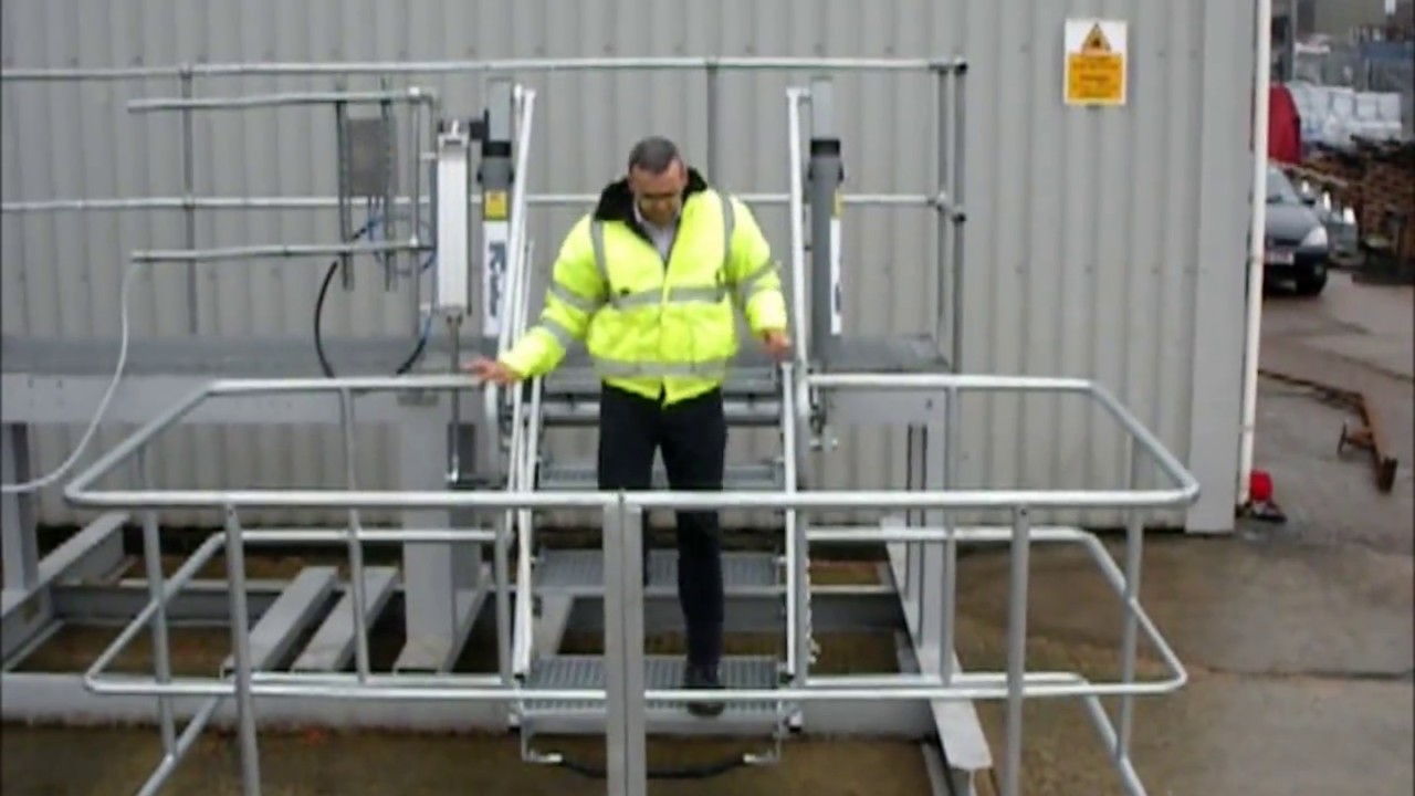 Safe tanker access - folding stairs with air power for road and rail ...