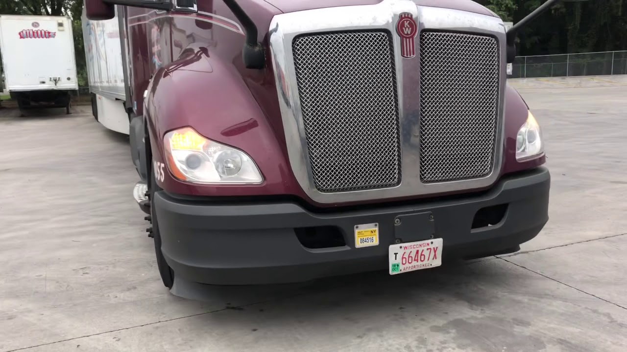 Coaching student on blind side backing in between 2 trailers - YouTube