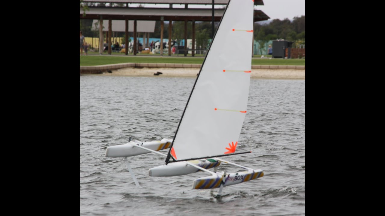 One Metre Trimarans - Una rig and outboard foils - YouTube