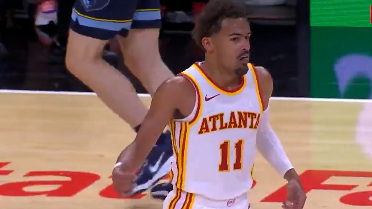 Trae Young downs it for the Hawks from WAY DEEP - YouTube