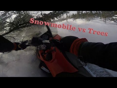 Snowmobile crash into the trees - YouTube