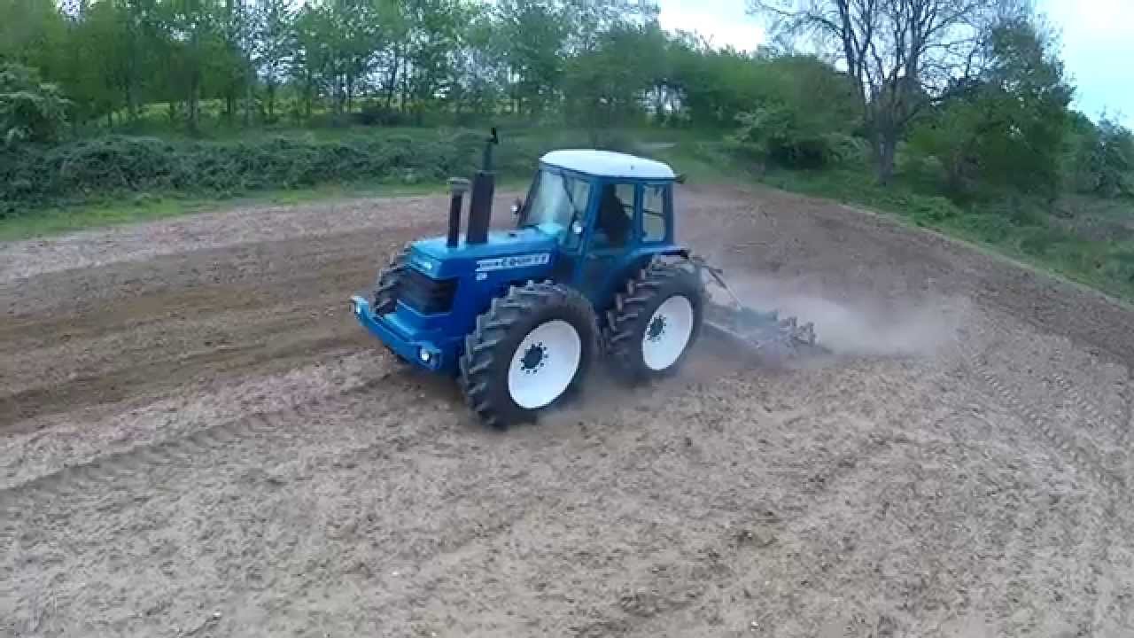 County 1474 tractor out with the springtine - YouTube
