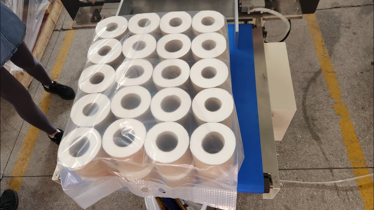 Manual 48 toilet paper rolls packing machine - YouTube