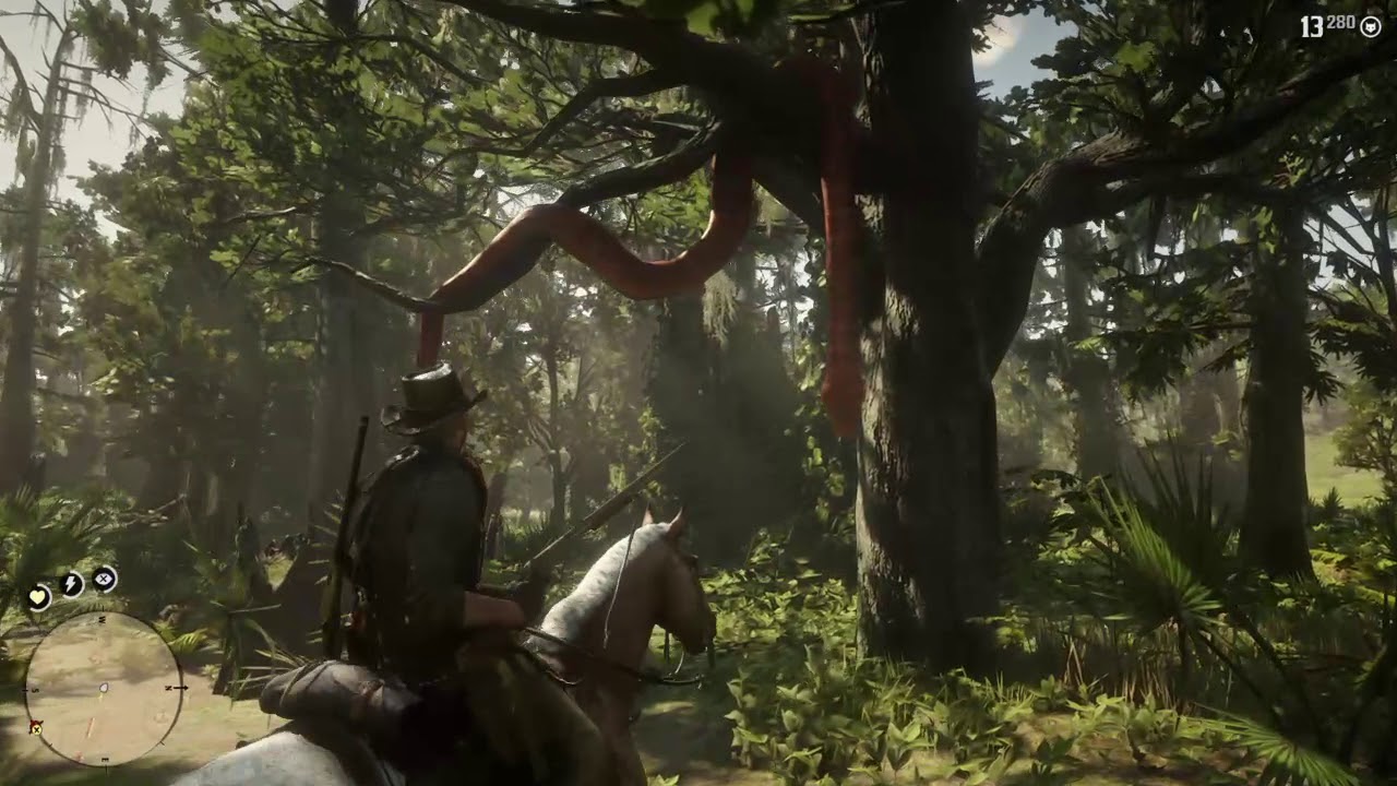 RDR2 why is there a giant, dead snake hanging in a tree??? - YouTube