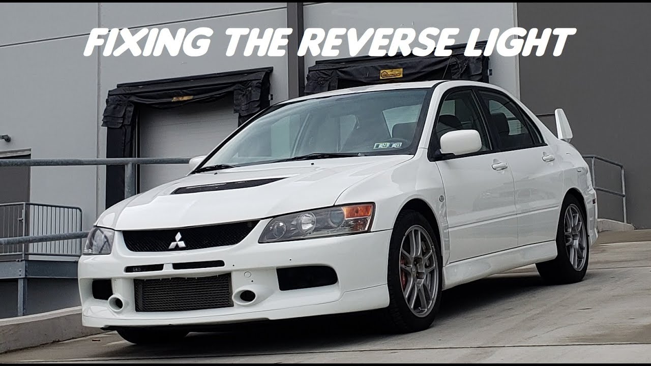 fixing the reverse light on the EVO IX - YouTube