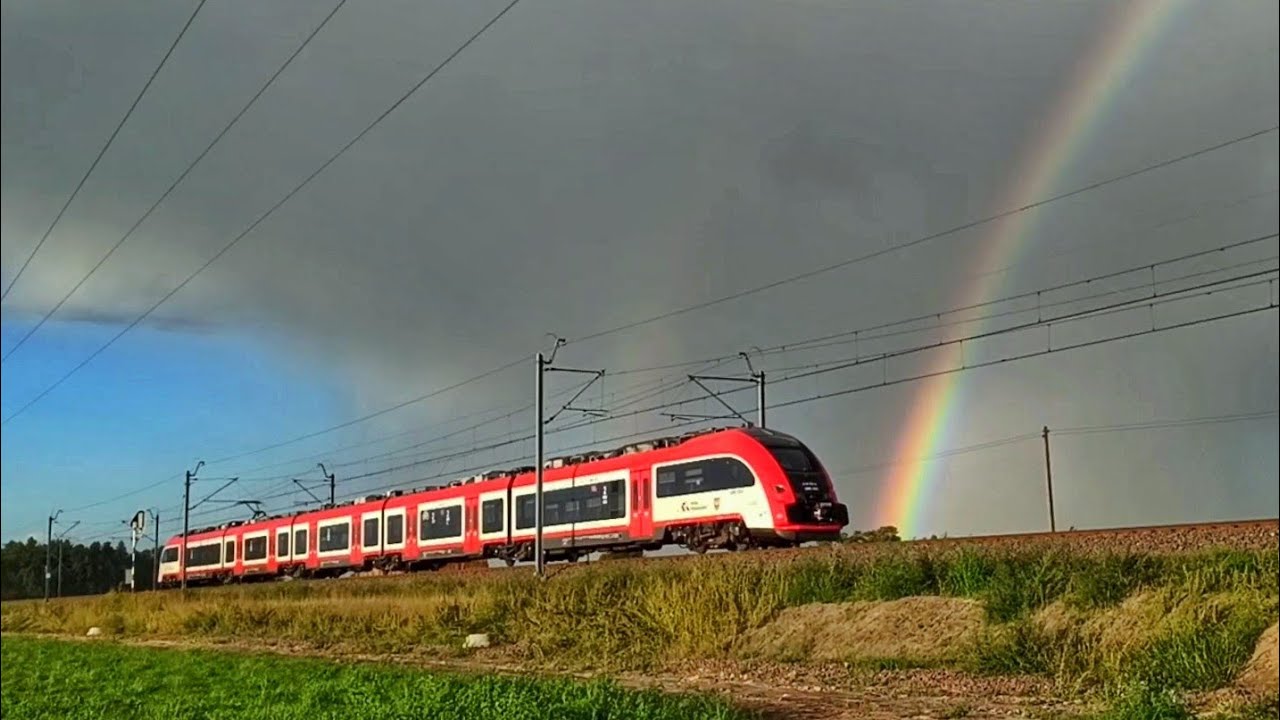🌈 48WE-010 jako pociąg PKM1 Poznań-Leszno na tle tęczy zbliża się do p ...