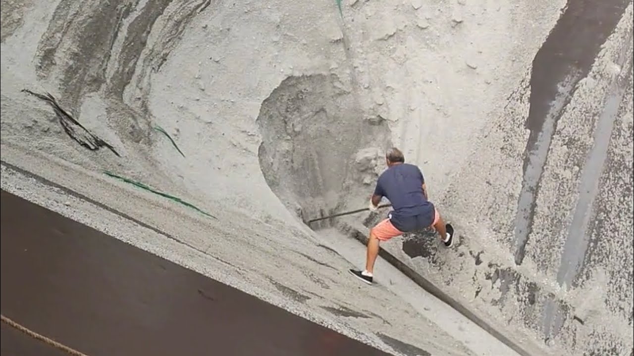 Amazing work - white sand unloading barge, skilled workers working ...