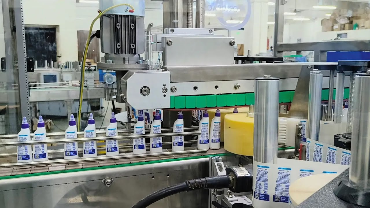 Front & Back Labelling Machine by Worldpack Automation Systems - YouTube