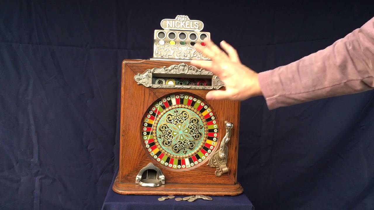 Cast iron and Oak Caille Ben Hur Victorian Era Slot Machine - YouTube