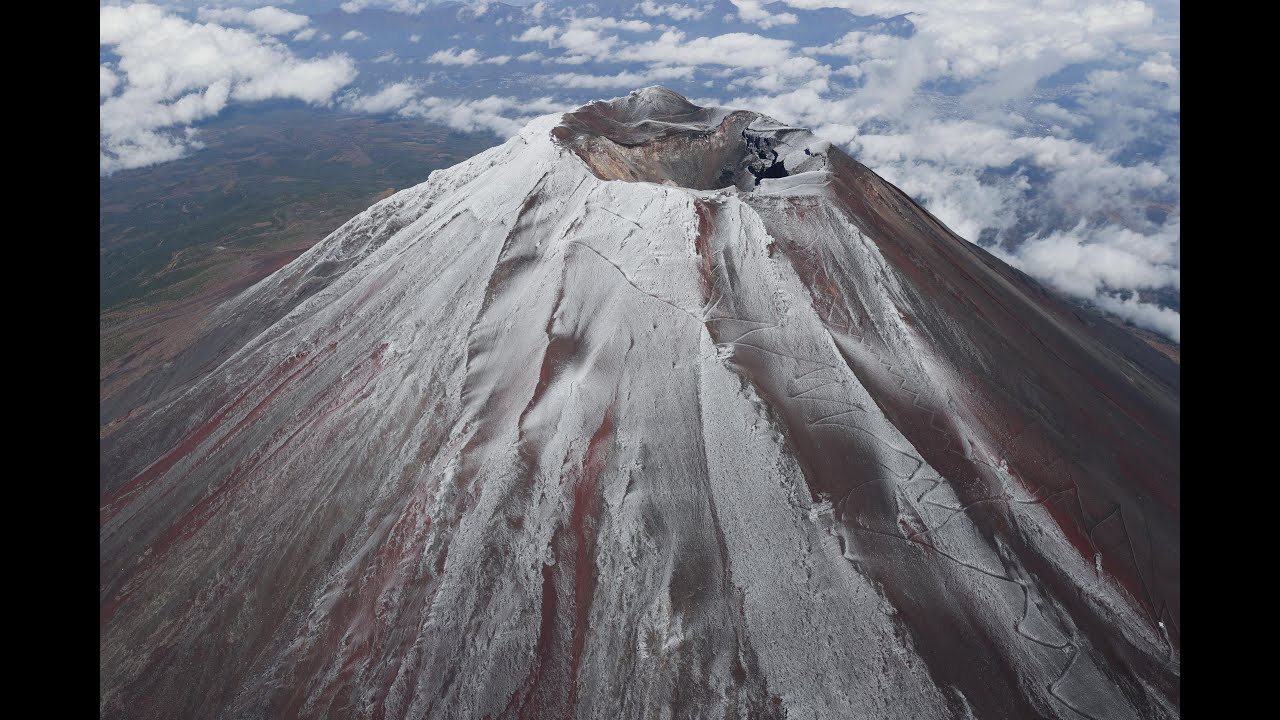 Japan's Mt. Fuji gets season's 1st snowcap - YouTube