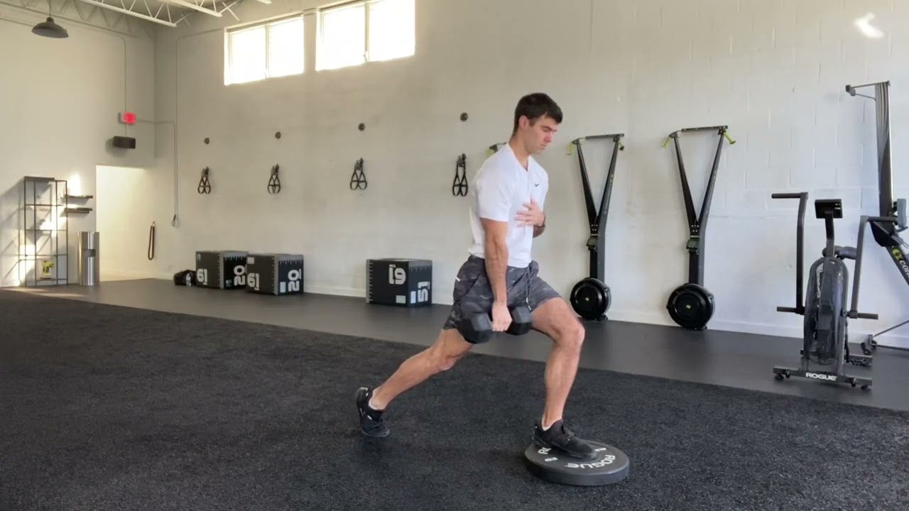 Front foot elevated dumbbell split squat contralateral load - YouTube