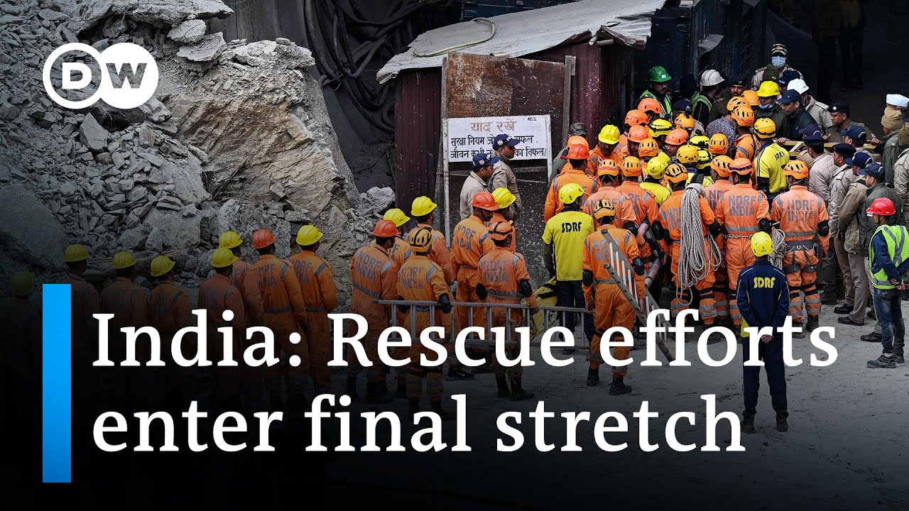 Indian rescuers reach 41 workers trapped in tunnel | DW News - YouTube