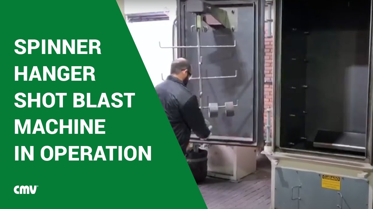 Spinner hanger shot blast machine with double door in operation ...