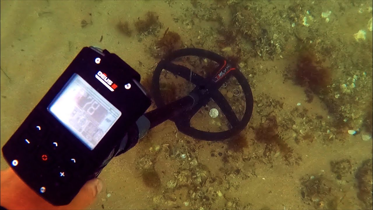 What's Buried UNDER these Rocks? Found while Metal Detecting Underwater ...