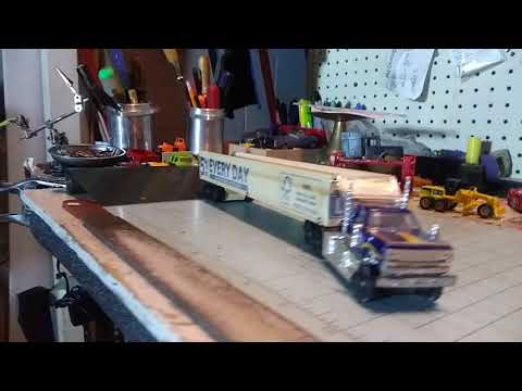 Mexican semi truck with Lowe's wood trailer