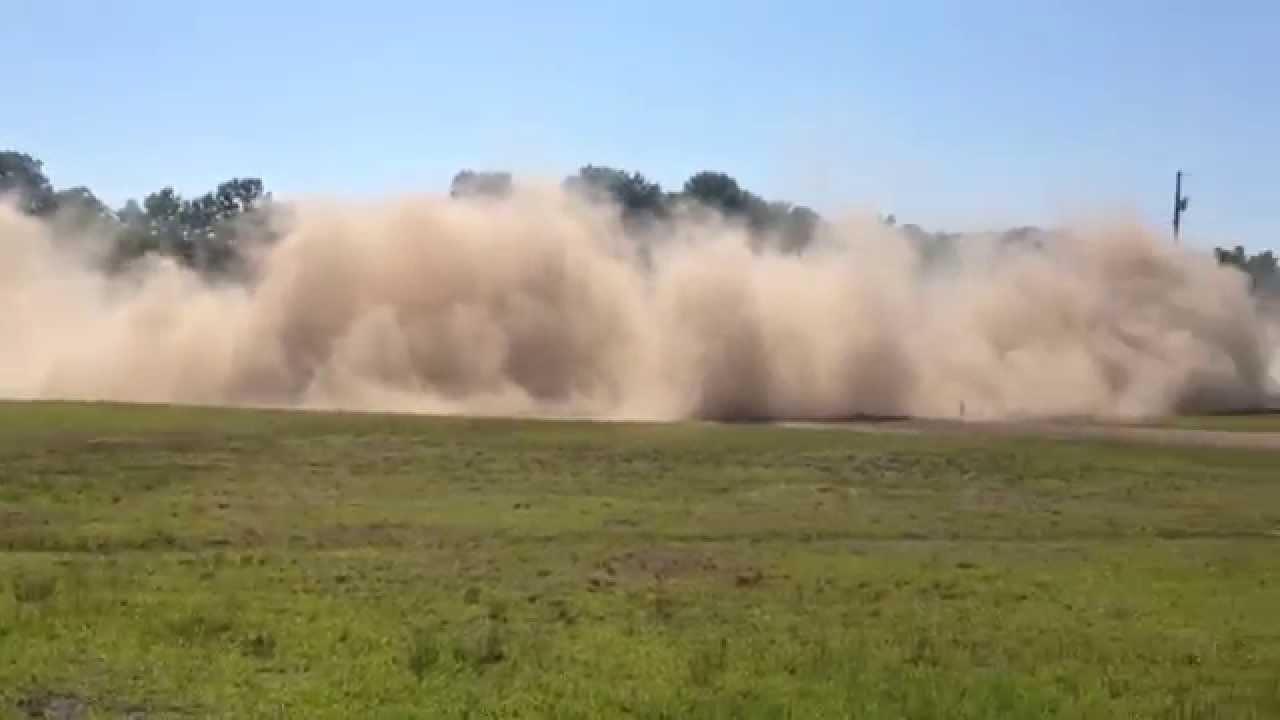 Rally Car Kicking up Cloud of Dust - YouTube