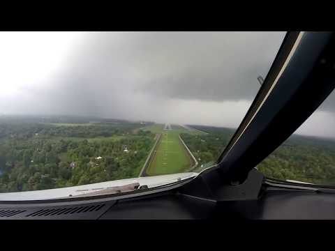 Beautiful scene of flight landing in rain at Cochin International Airport
